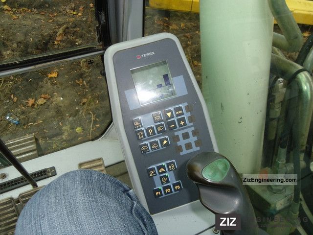 Terex TC210NLC 2006 Caterpillar digger Construction Equipment Photo and Specs